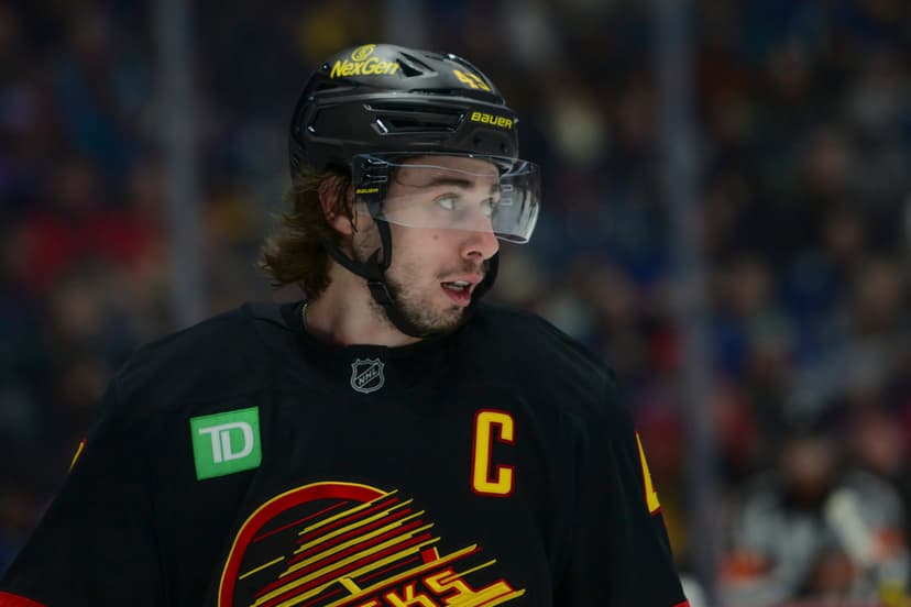 Canucks’ Adam Foote says Quinn Hughes trade talk has made it into team ...